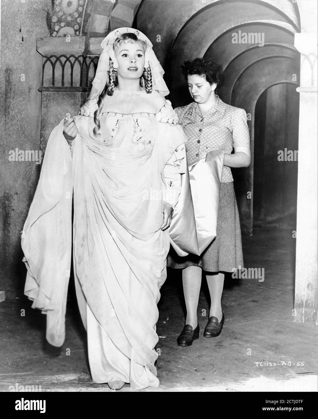 JEAN SIMMONS on set candid with Wardrobe Assistant during the filming ...