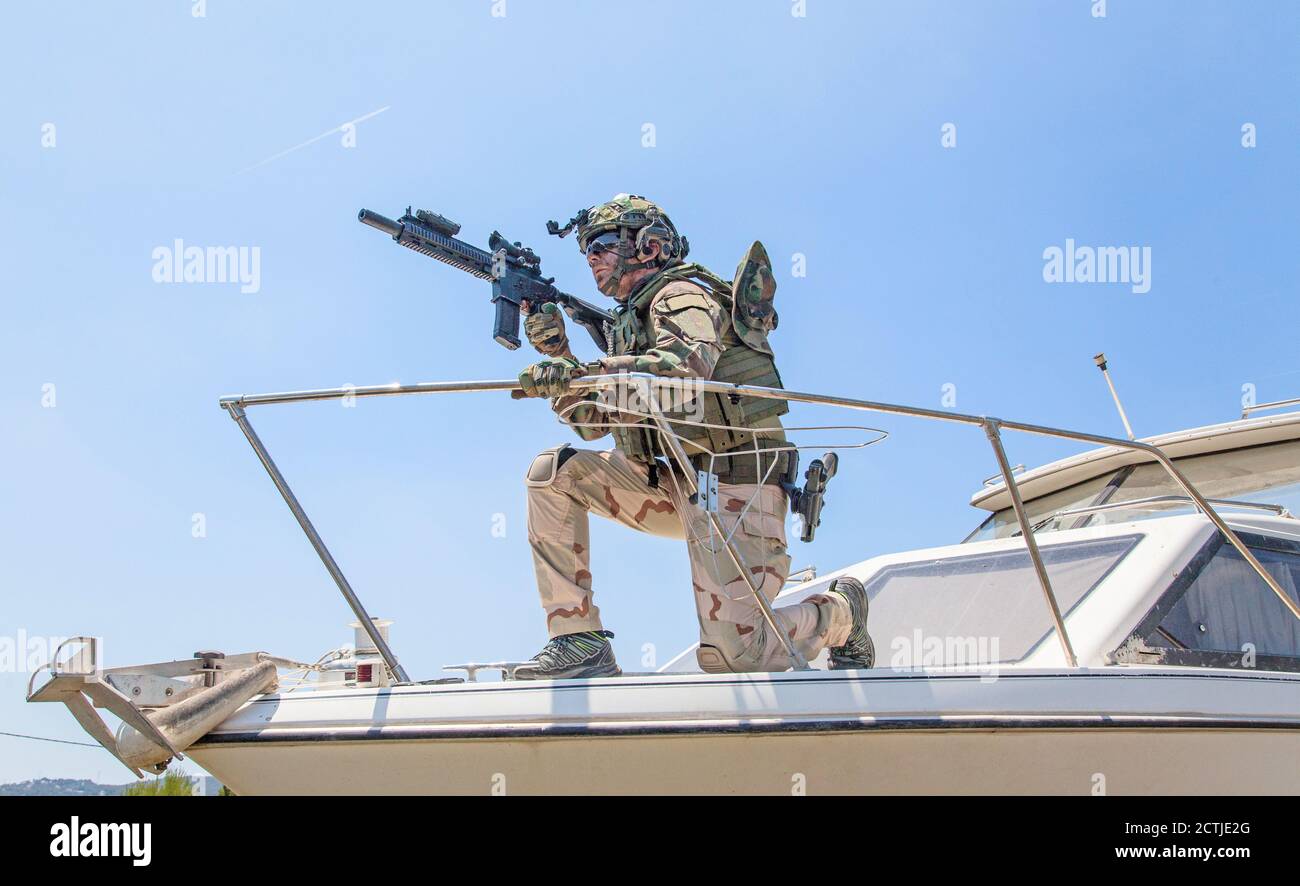 Army special forces soldier, commando fighter in full ammunition ...