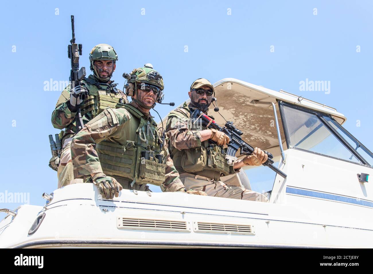 Army special operations soldiers, SEALs team, elite commando fighters ...