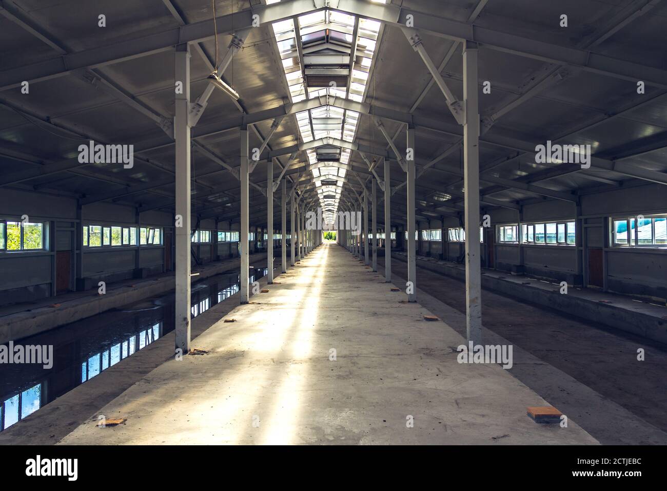 Inside a rural hangar under construction. Construction of an ...