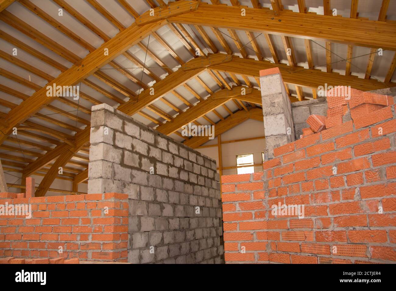 Brickwork inside the building. Construction of walls of red brick and ...