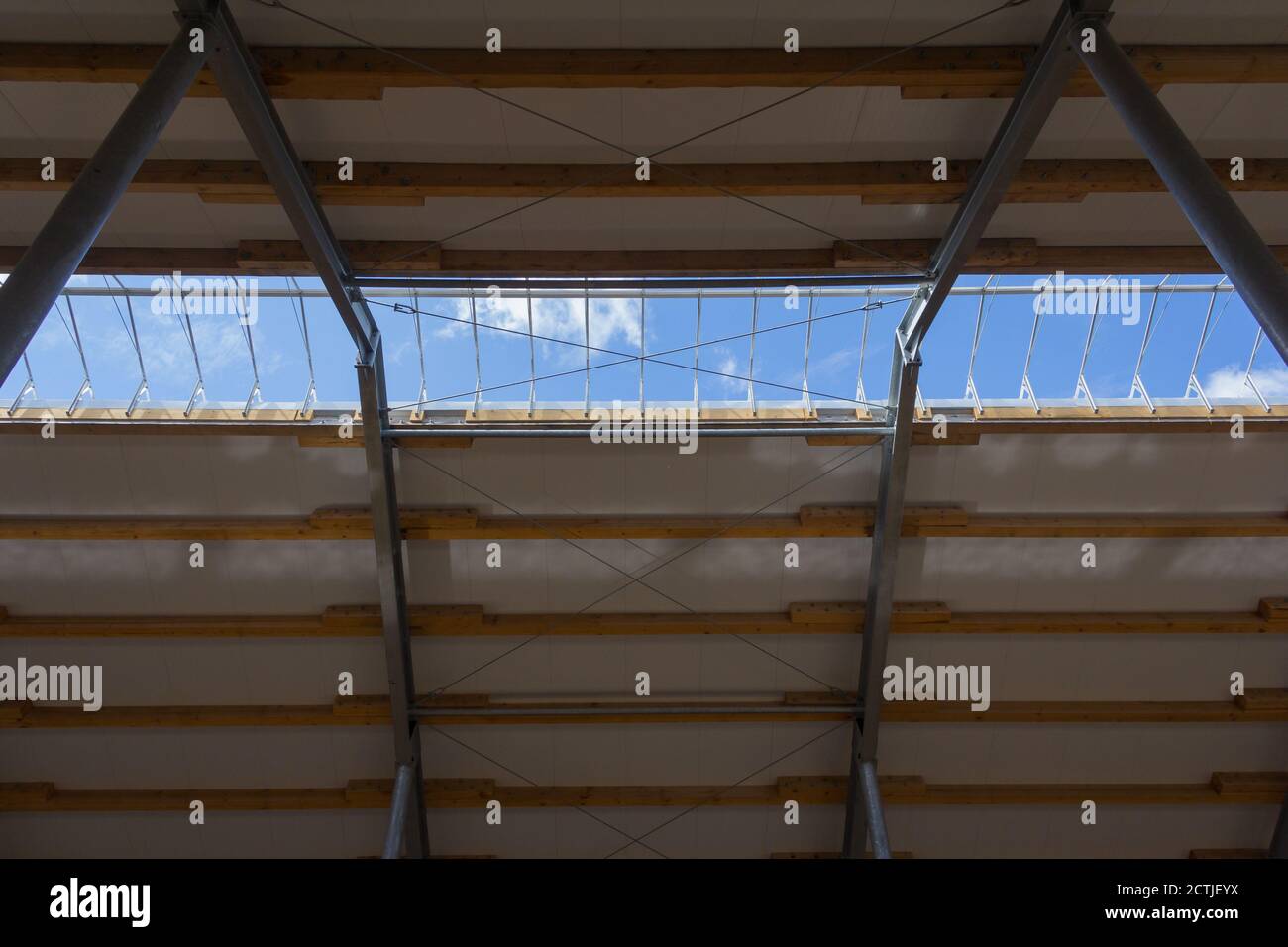 Metal frame of the building with a sandwich panel of insulation on the ...