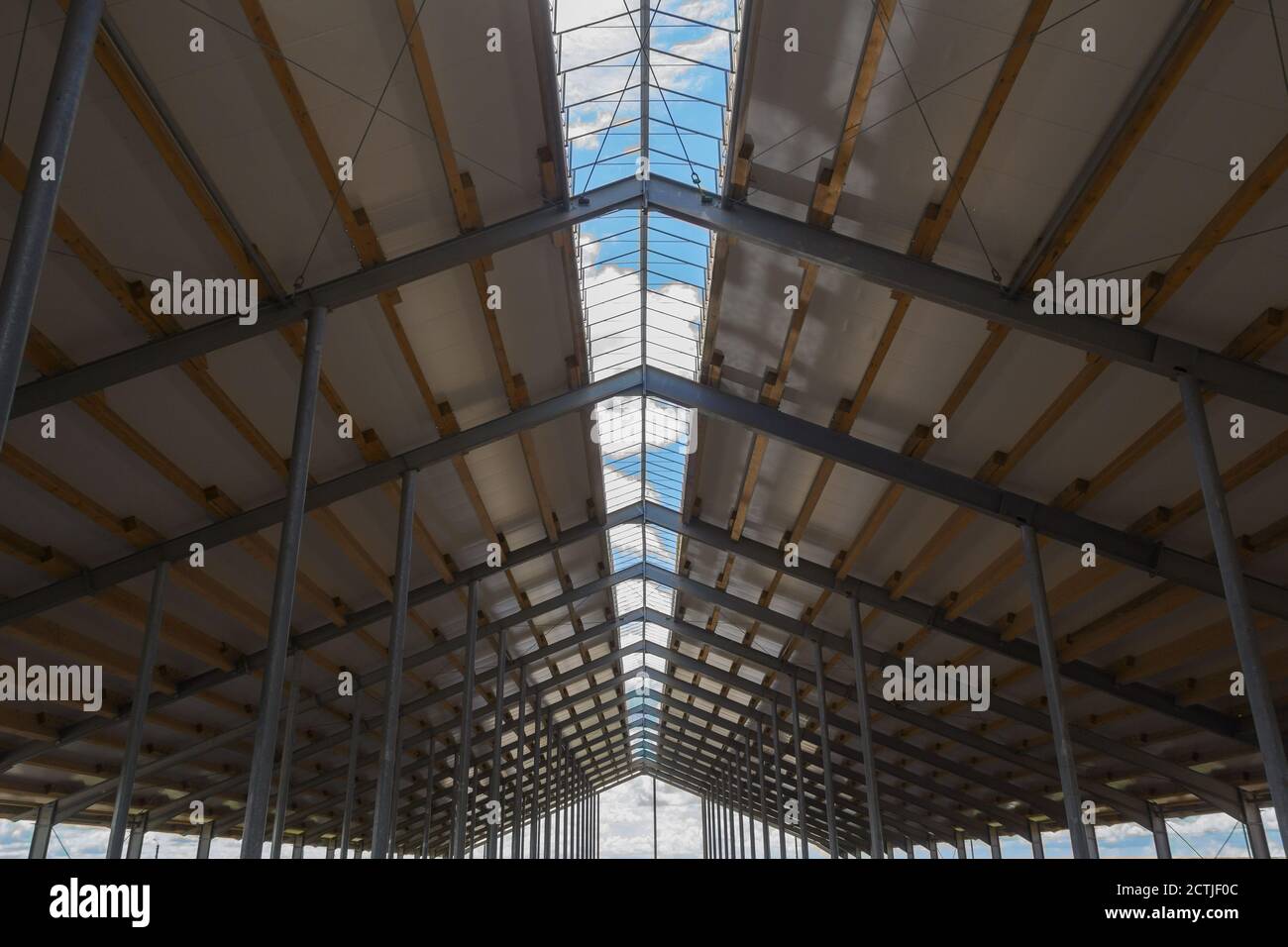 Metal frame of the building with a sandwich panel of insulation on the ...