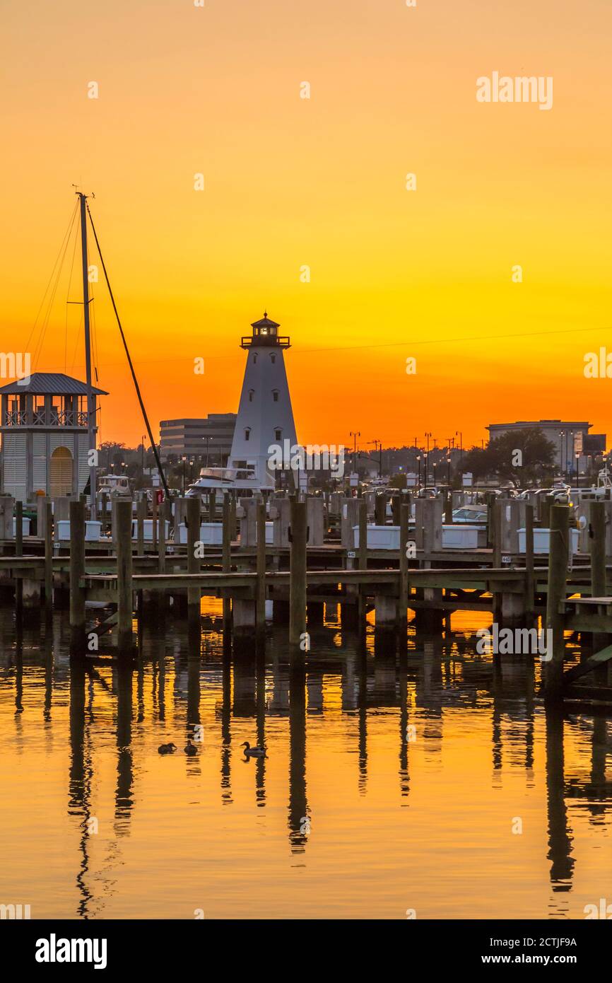 Lighthouse at the Small Craft Harbor in Gulfport, Mississippi at sunset ...