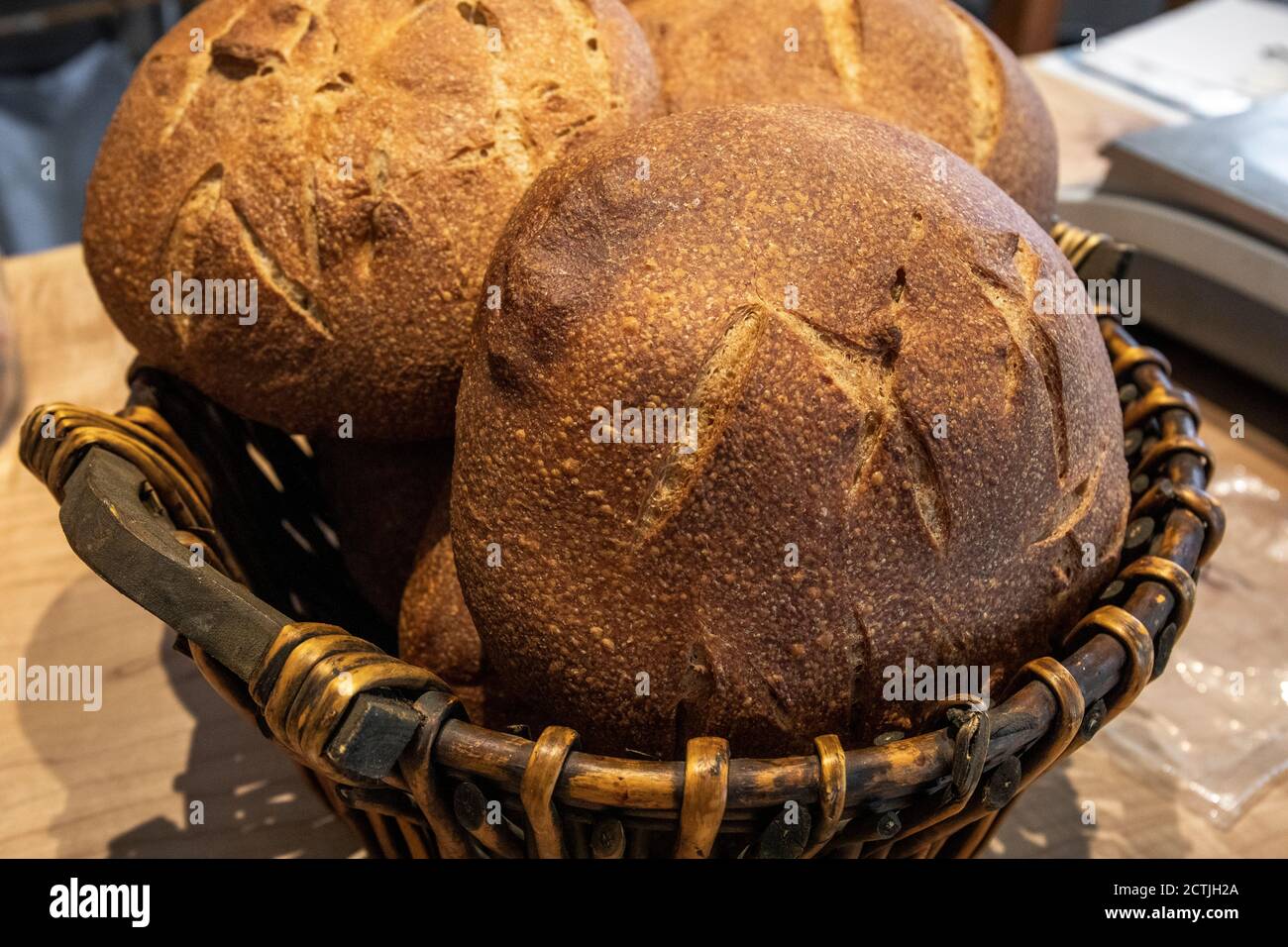 High angle of loaves of freshly baked rye bread with crunchy crust ...