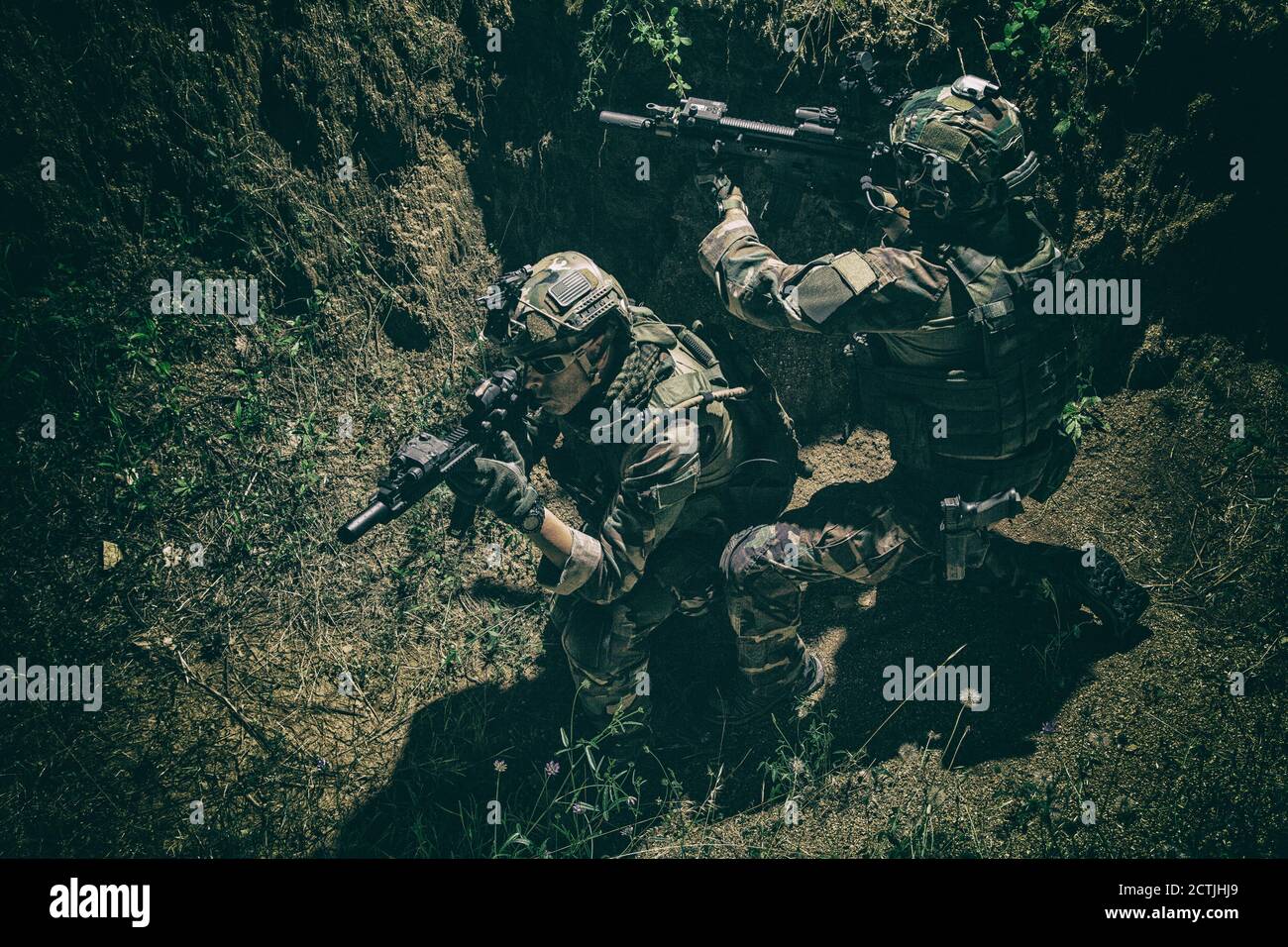 Two army soldiers, Navy SEALs team shooters wearing combat uniform ...