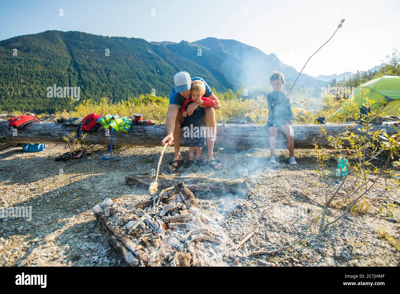 Father son eating campfire hi-res stock photography and images - Alamy