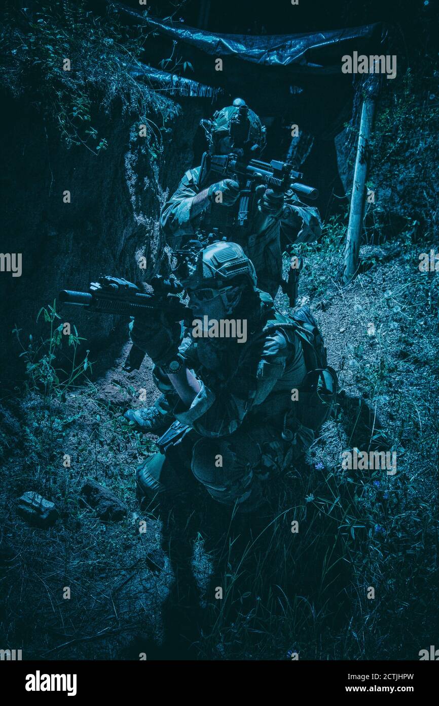 Two army soldiers, Navy SEALs team shooters wearing combat uniform ...