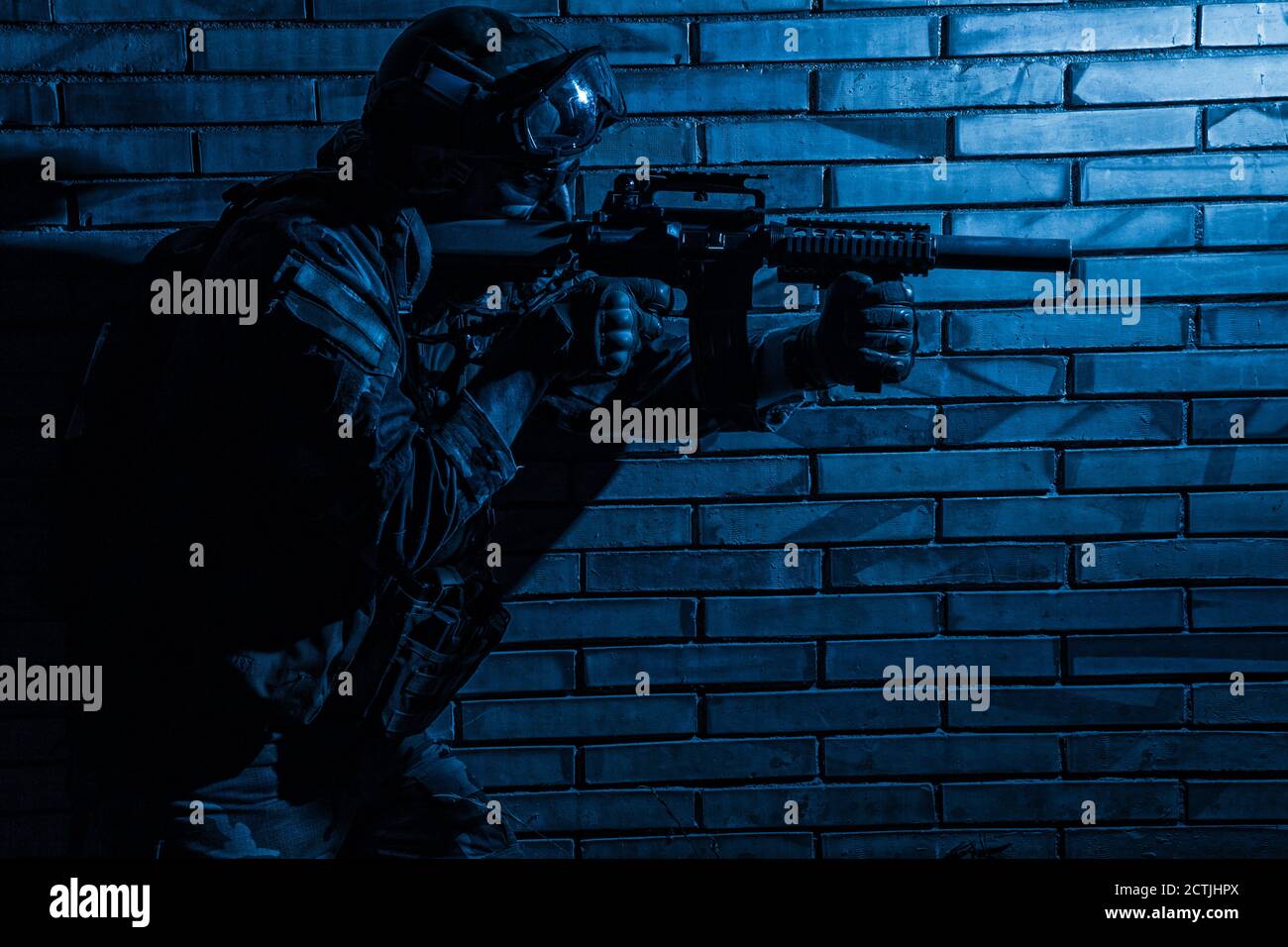 Army soldier, counter terrorist squad fighter in camouflage uniform ...