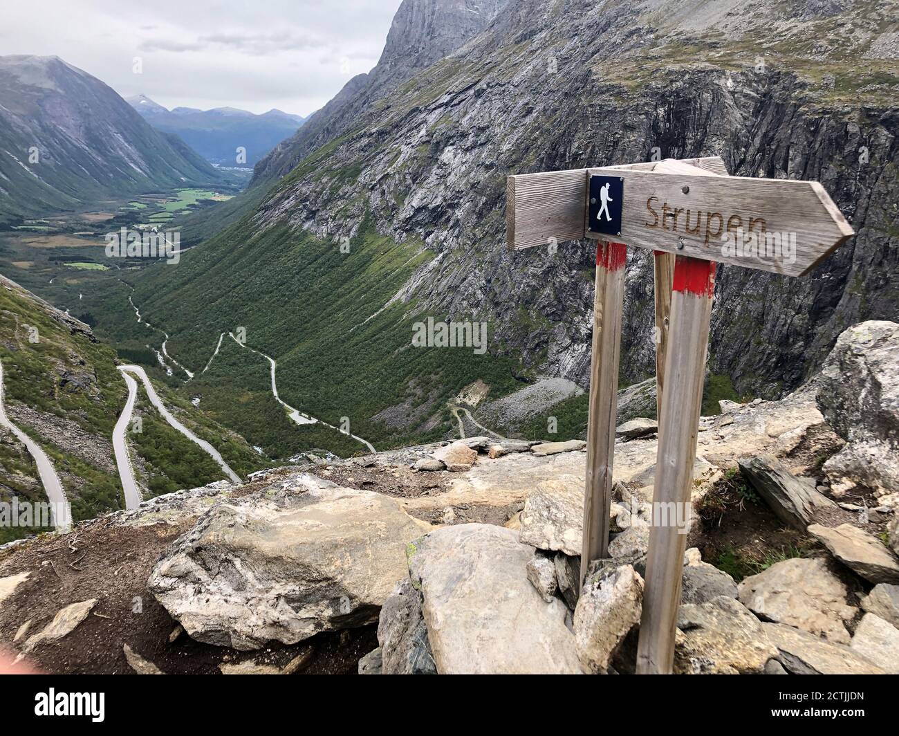A hiking sign post high in the Norwegian mountains Stock Photo - Alamy