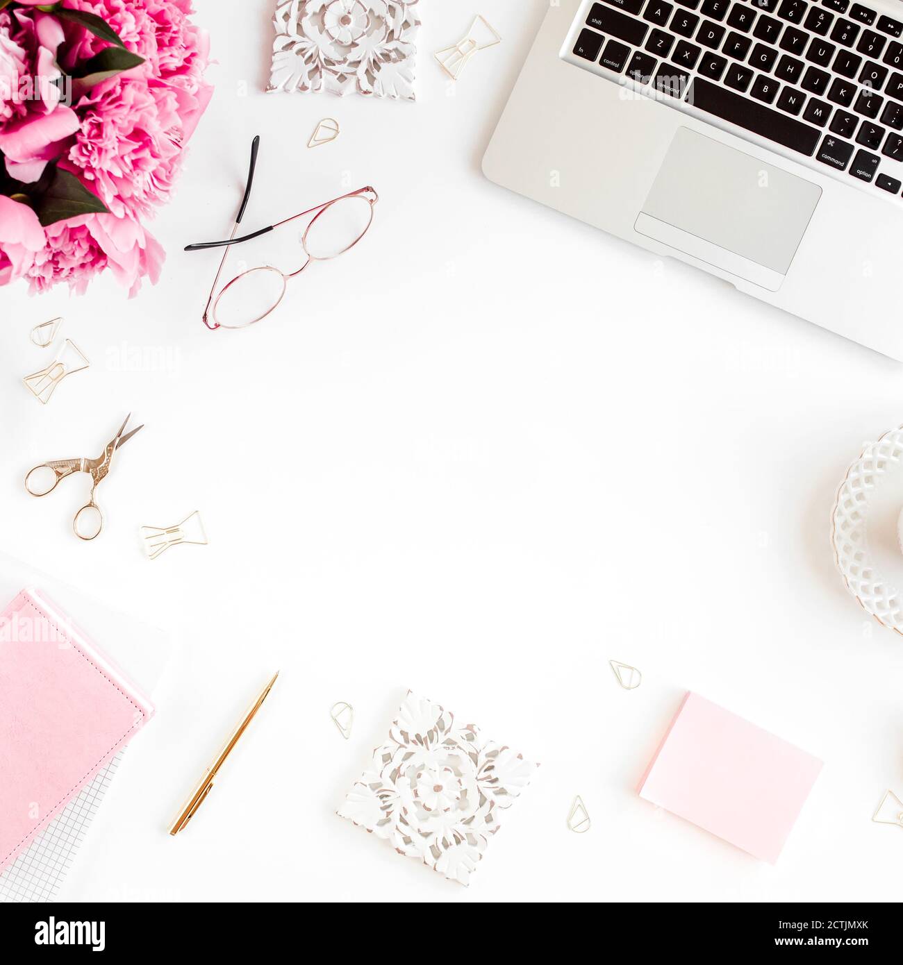 Flat lay women's office desk. Female workspace with laptop, pink ...