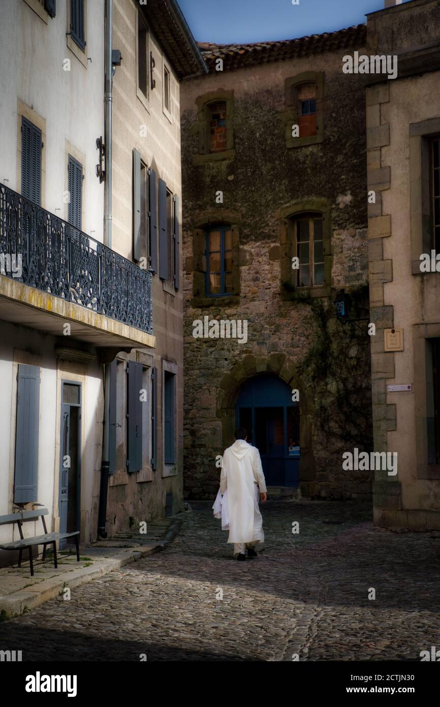 Catholic priest walking street hi-res stock photography and images - Alamy