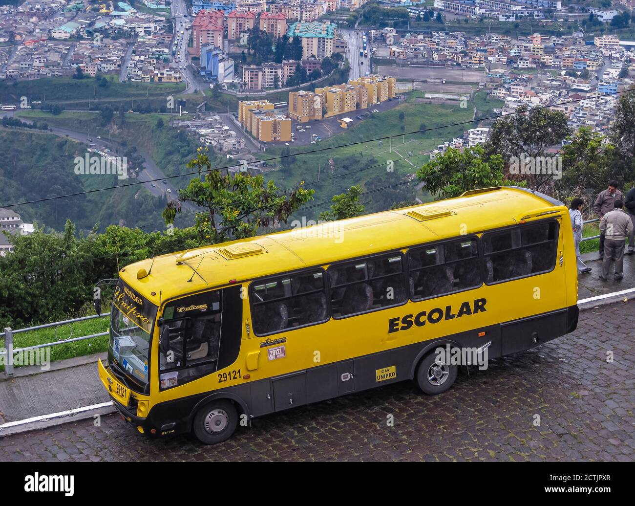Quito, Ecuador - December 2, 2008: Cerro El Panecillo. Yellow school ...