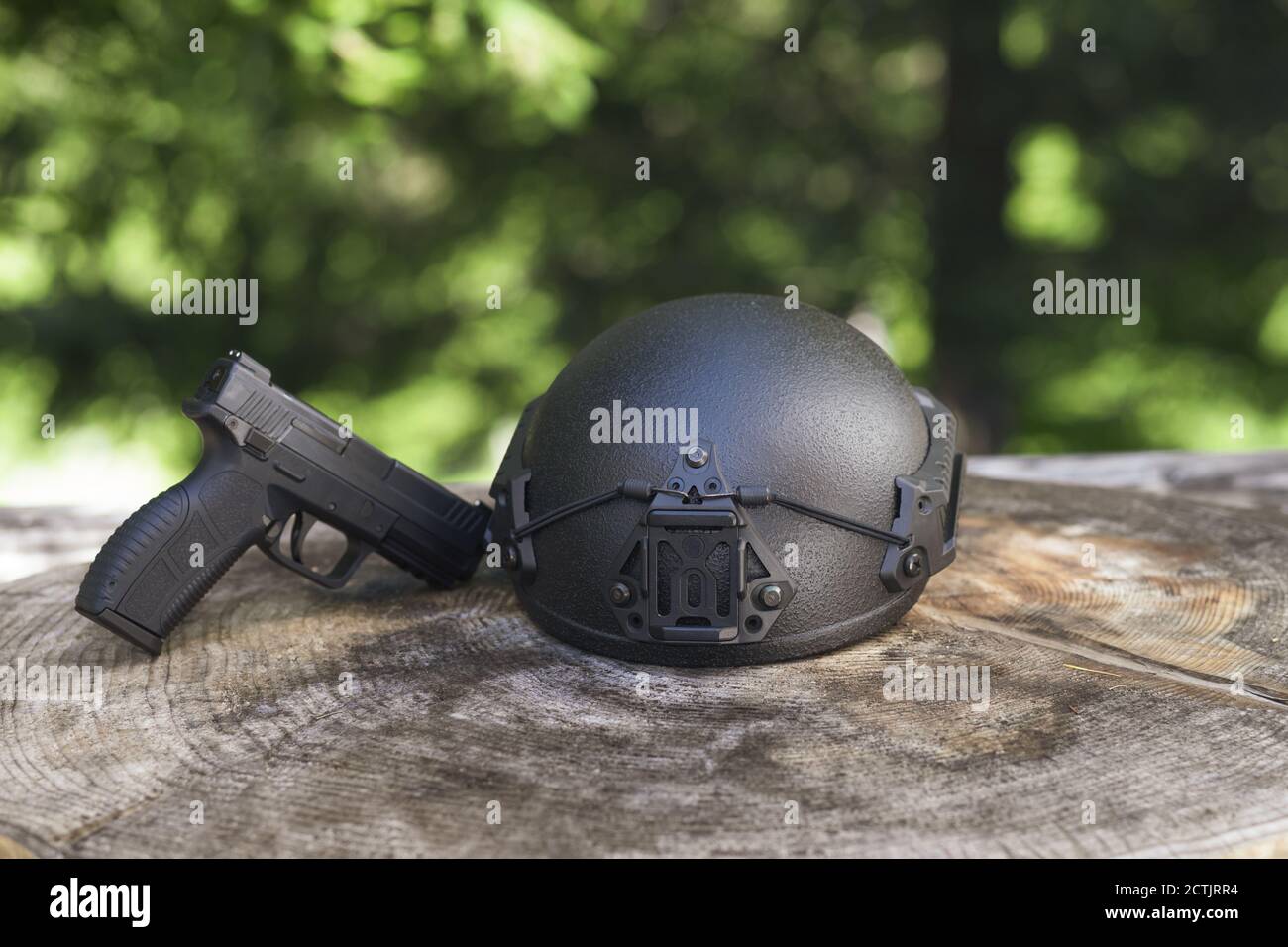 Helmet on gun hi-res stock photography and images - Alamy