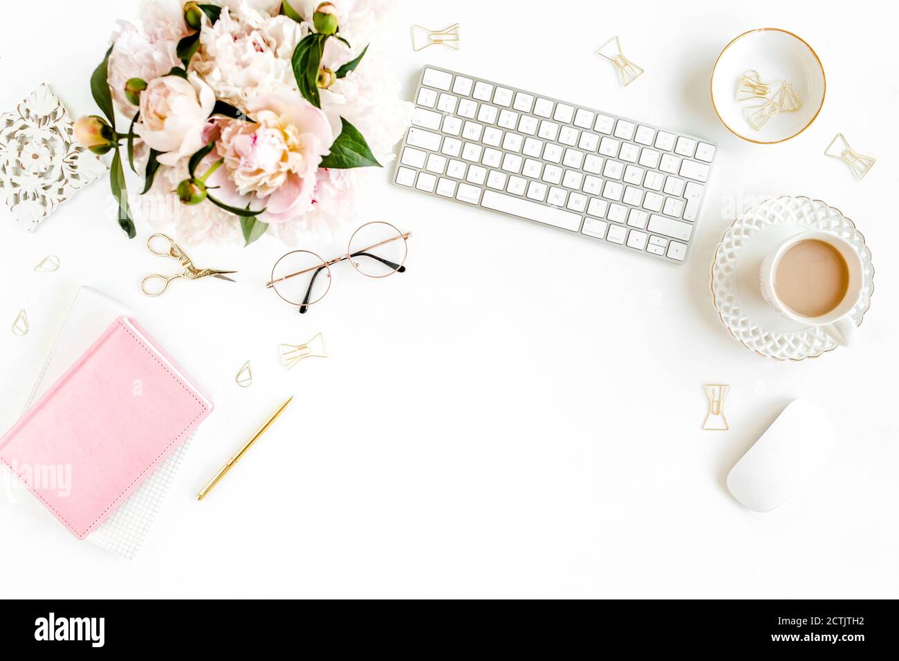 Flat lay women's office desk. Female workspace with computer, pink ...
