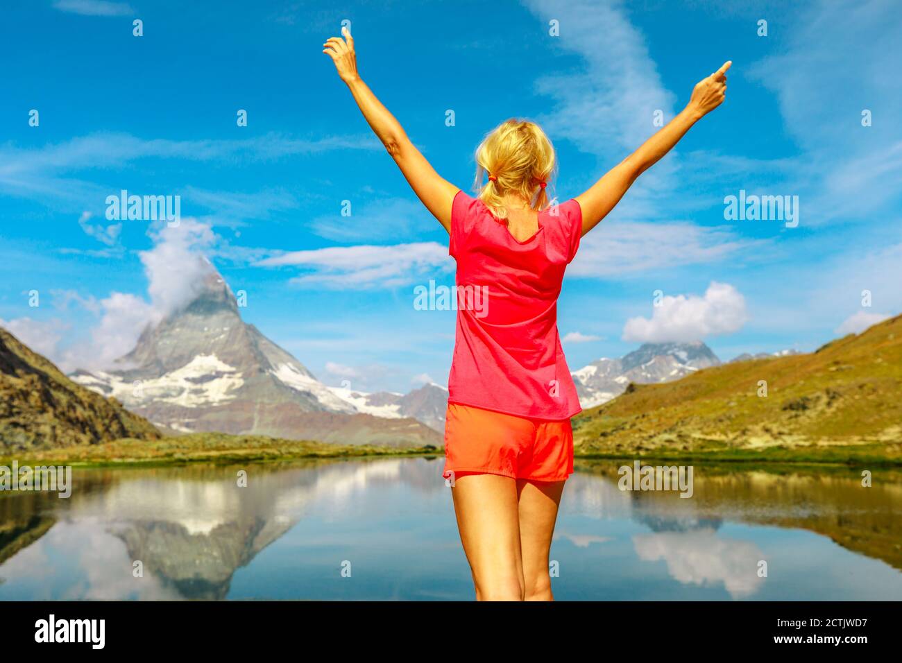 Mount Matterhorn and Swiss Alps are reflected on Riffelsee Lake ...