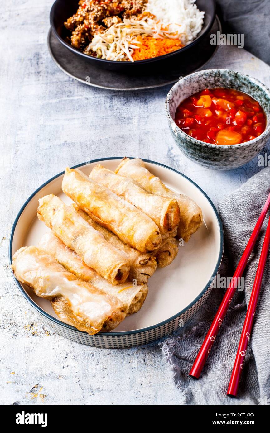 Homemade spring rolls and bowl of dipping sauce Stock Photo - Alamy