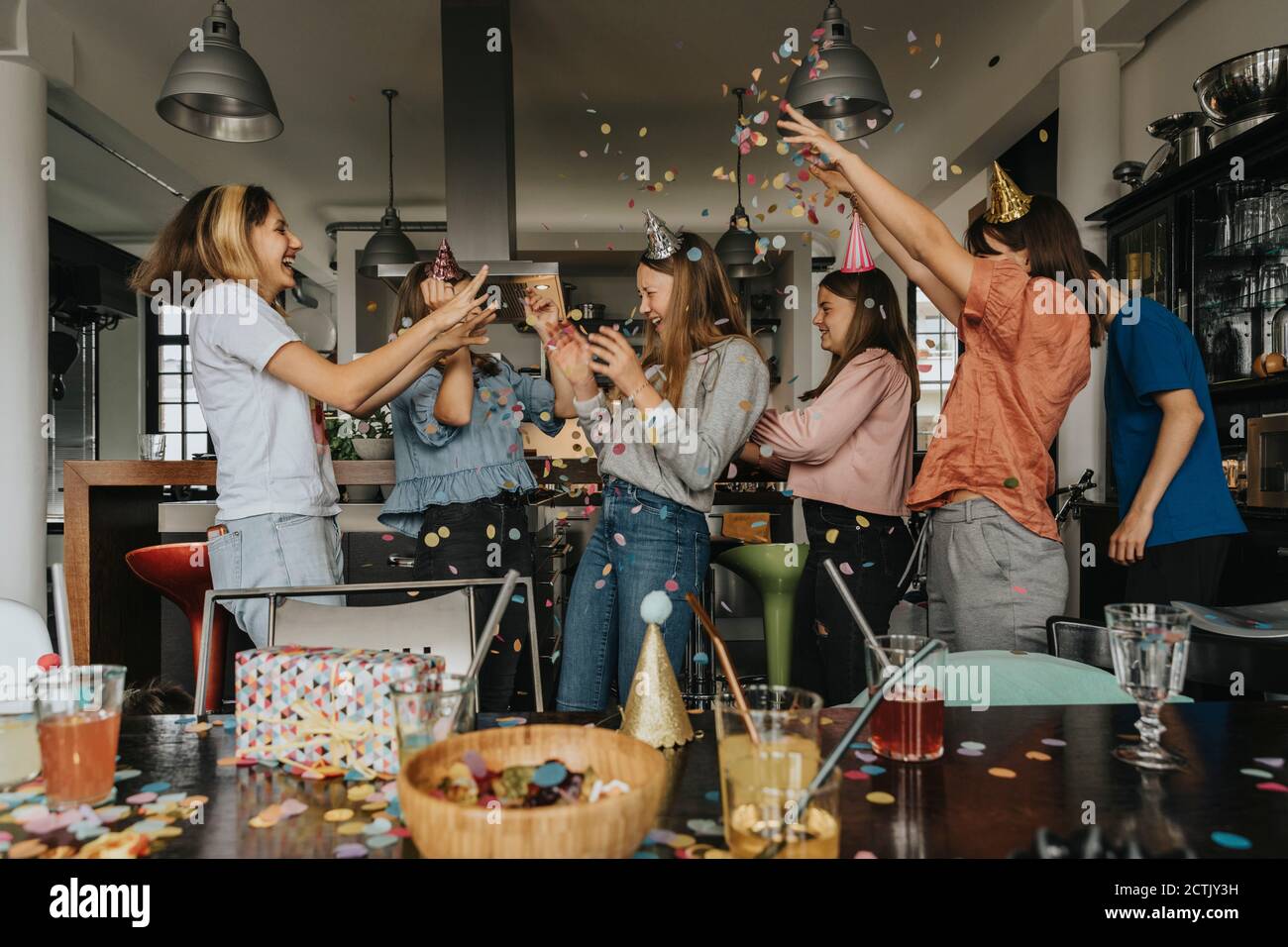Girl throwing confetti hi-res stock photography and images - Alamy