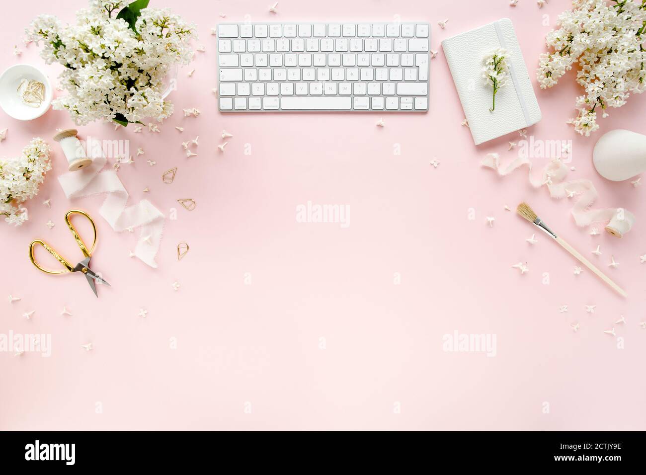 Office table desk with computer, lilac, clipboard. magazines. Top view ...
