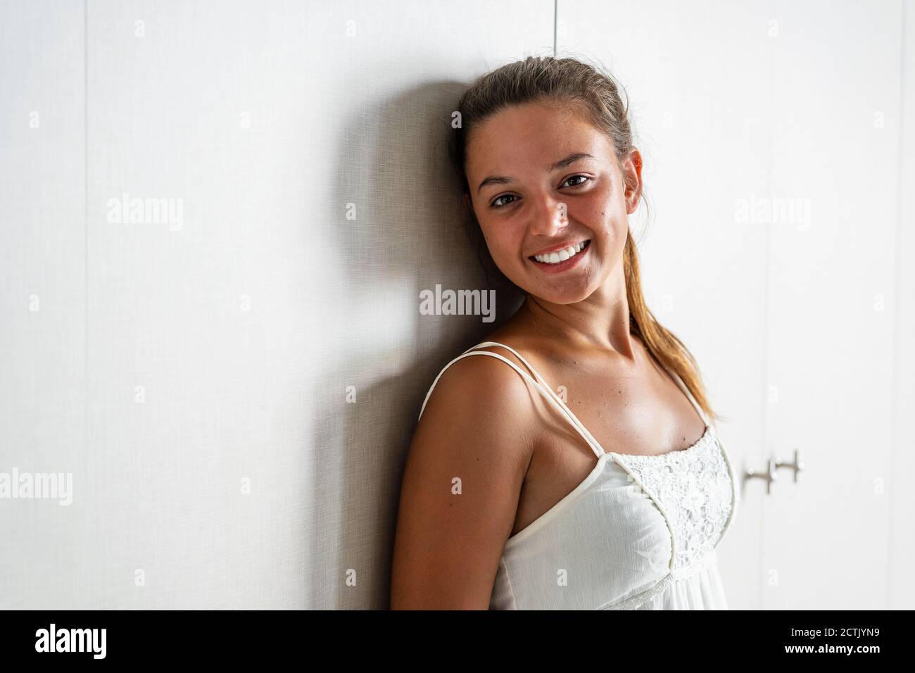 Beautiful woman smiling home hi-res stock photography and images - Alamy