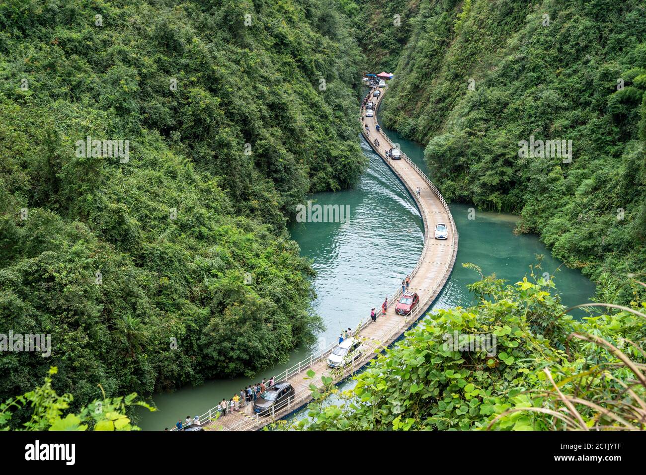 Aerial view of people walking on a float bridge at Shiziguan Village in ...