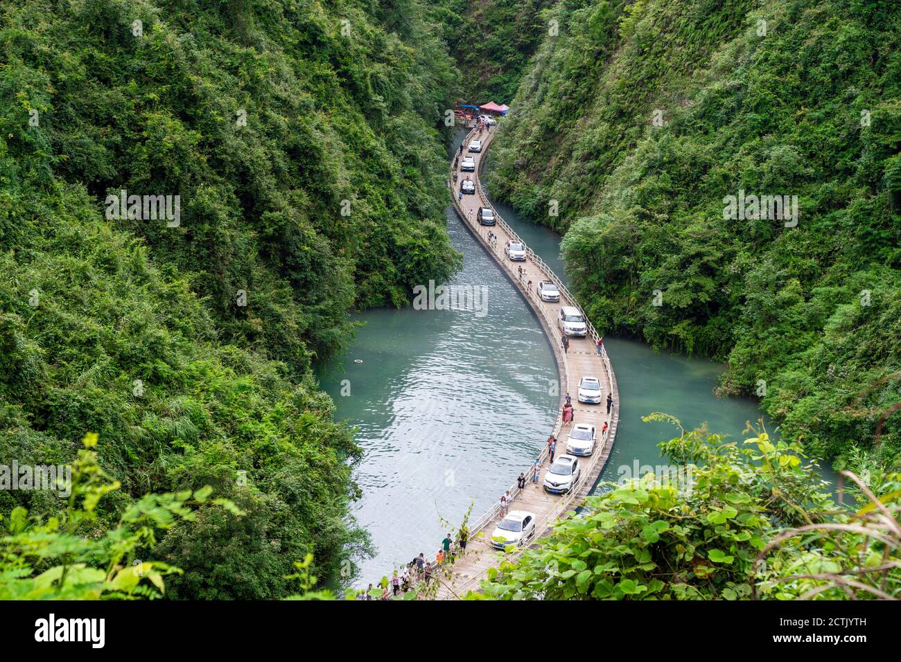 Aerial view of people walking on a float bridge at Shiziguan Village in ...