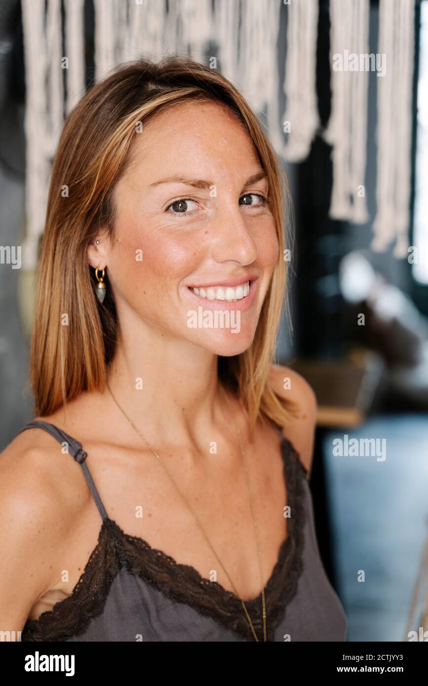 Beautiful woman standing hi-res stock photography and images - Alamy