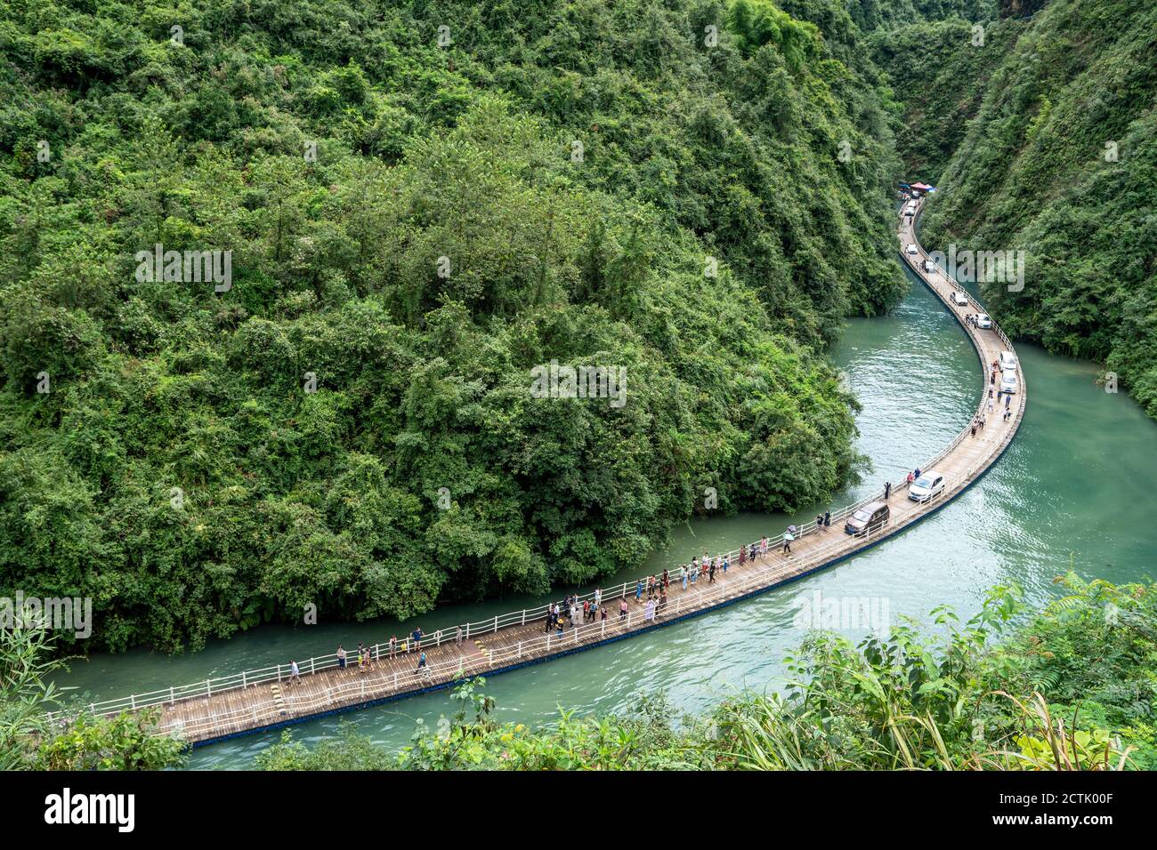 Aerial view of people walking on a float bridge at Shiziguan Village in ...