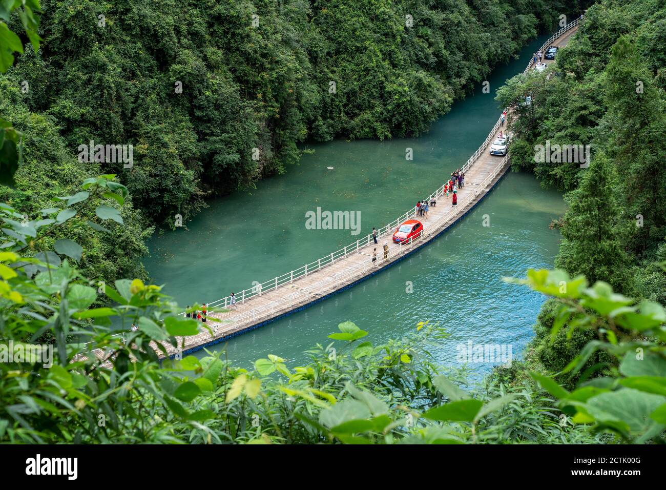 Aerial view of people walking on a float bridge at Shiziguan Village in ...