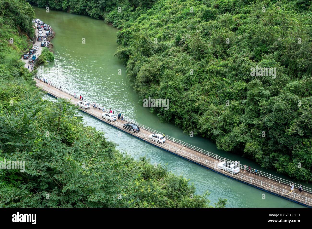 Aerial view of people walking on a float bridge at Shiziguan Village in ...