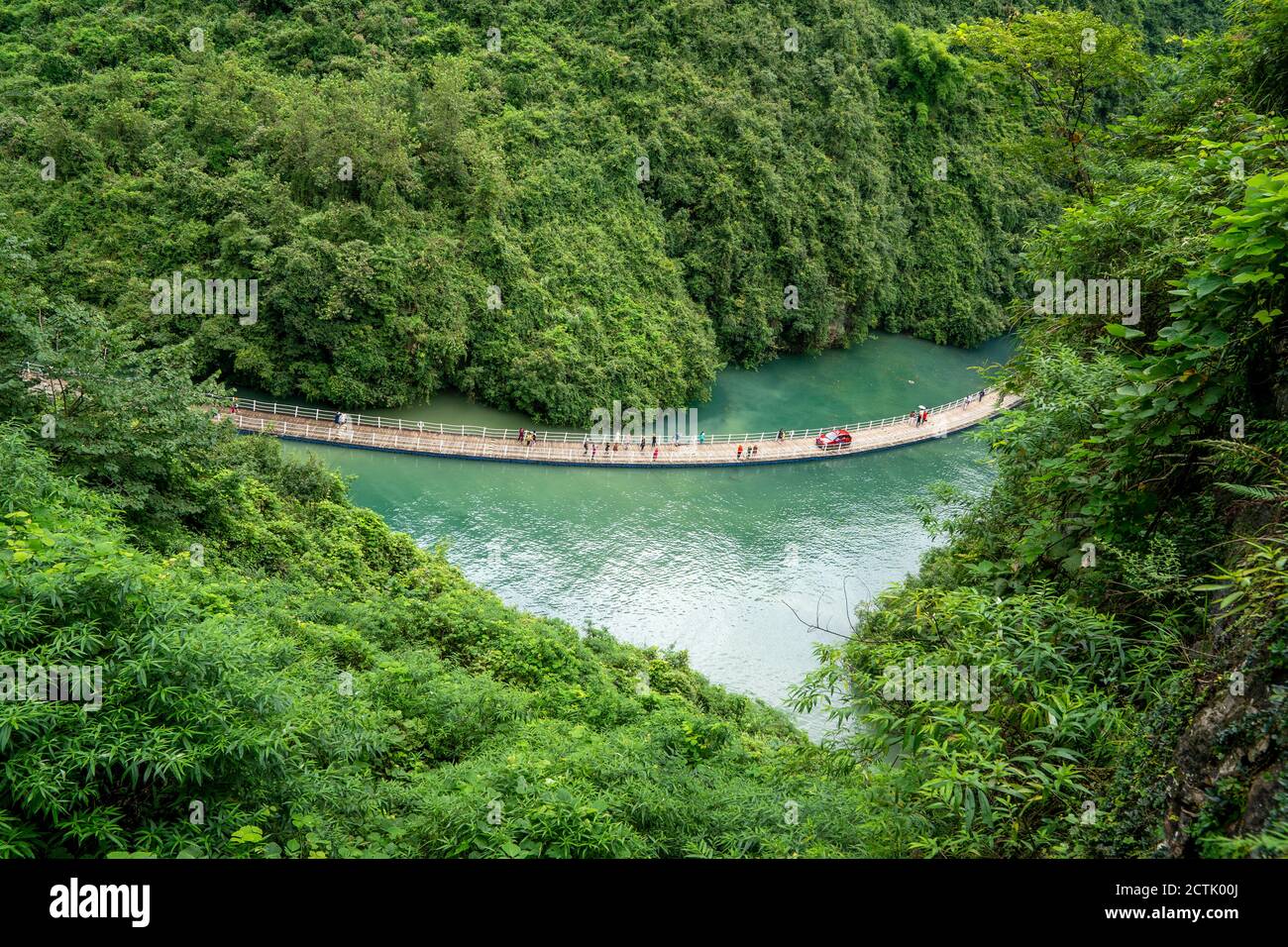 Aerial view of people walking on a float bridge at Shiziguan Village in ...