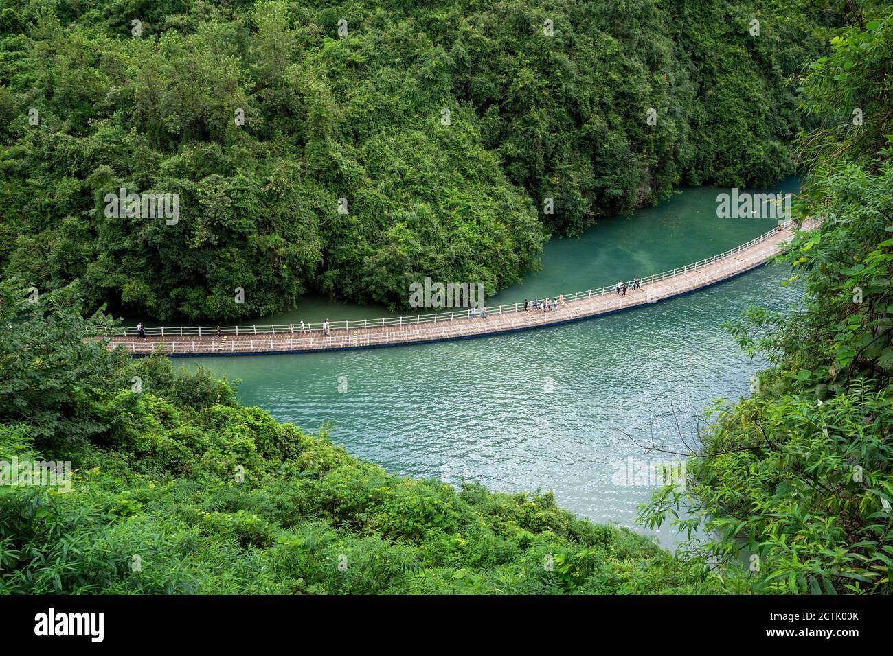 Aerial view of people walking on a float bridge at Shiziguan Village in ...