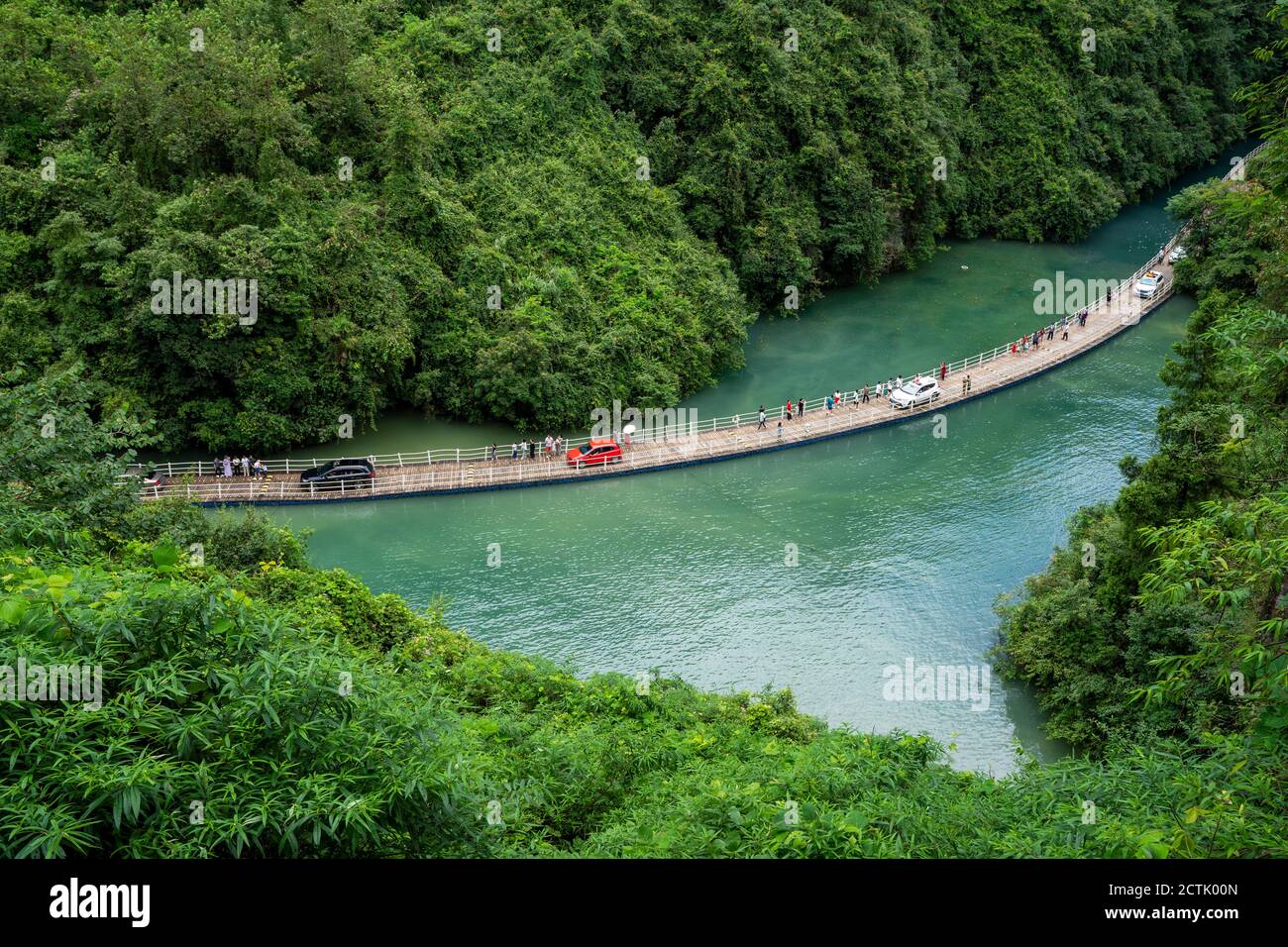 Aerial view of people walking on a float bridge at Shiziguan Village in ...