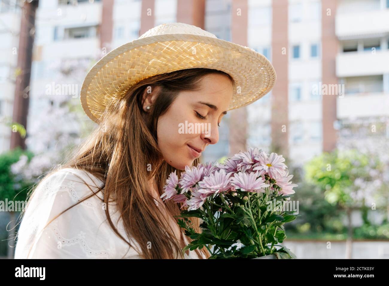 beautiful young woman smelling fresh green apple Stock Photo - Alamy