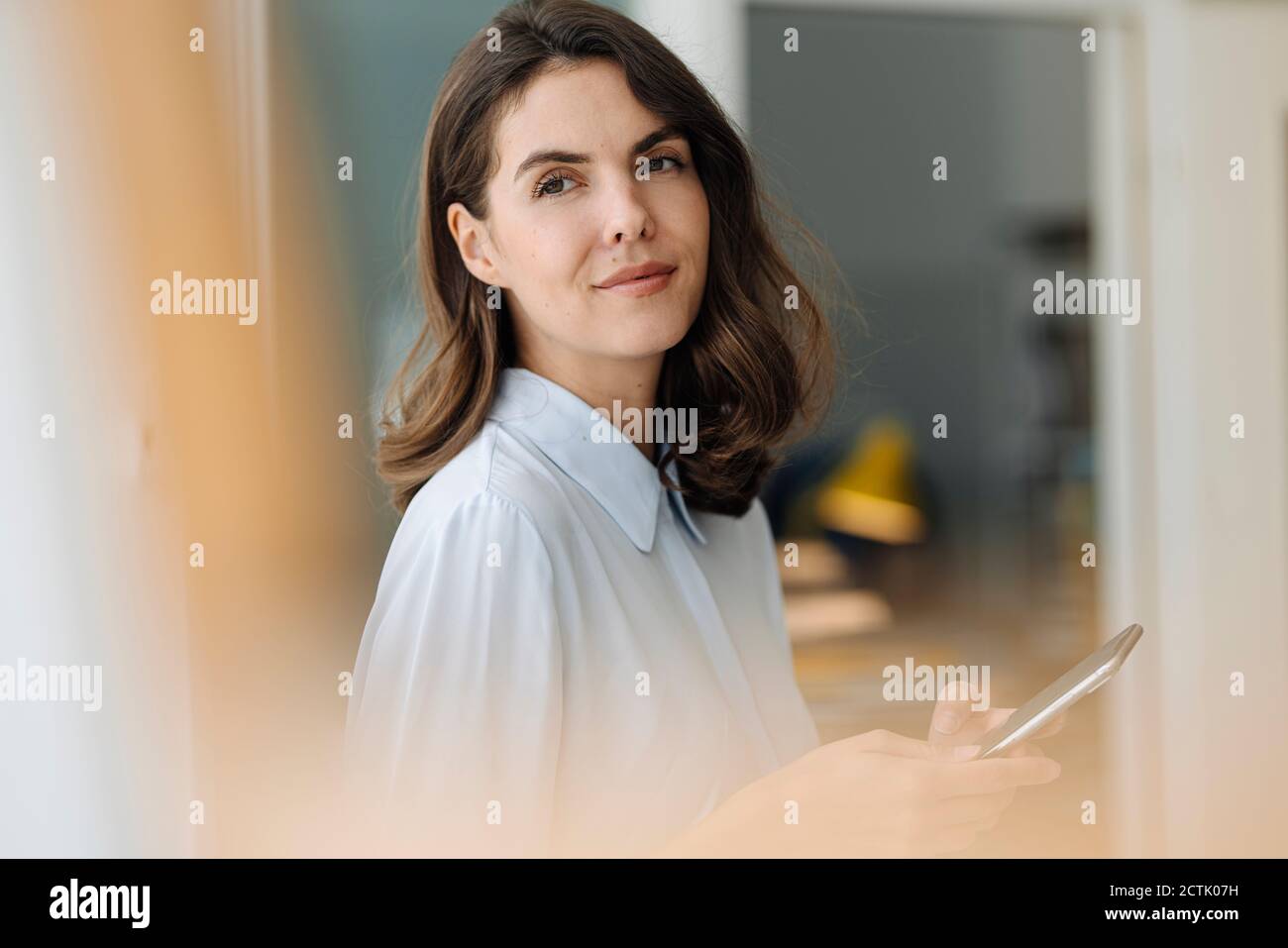 Standing communication looking away smiling the media hi-res stock ...