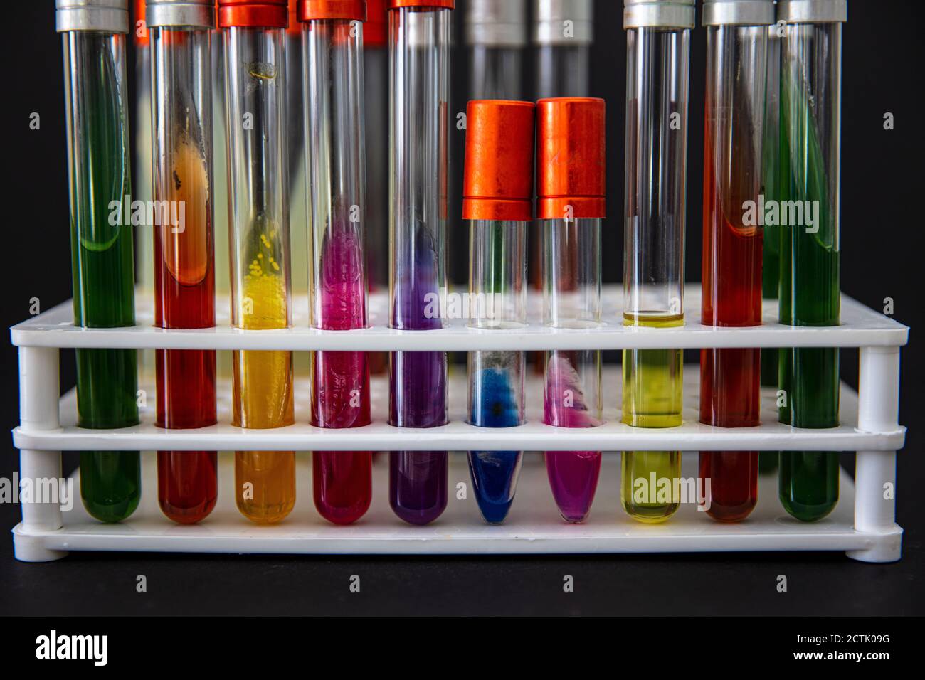 colorful rows of laboratory test tubes , science background. Laboratory ...