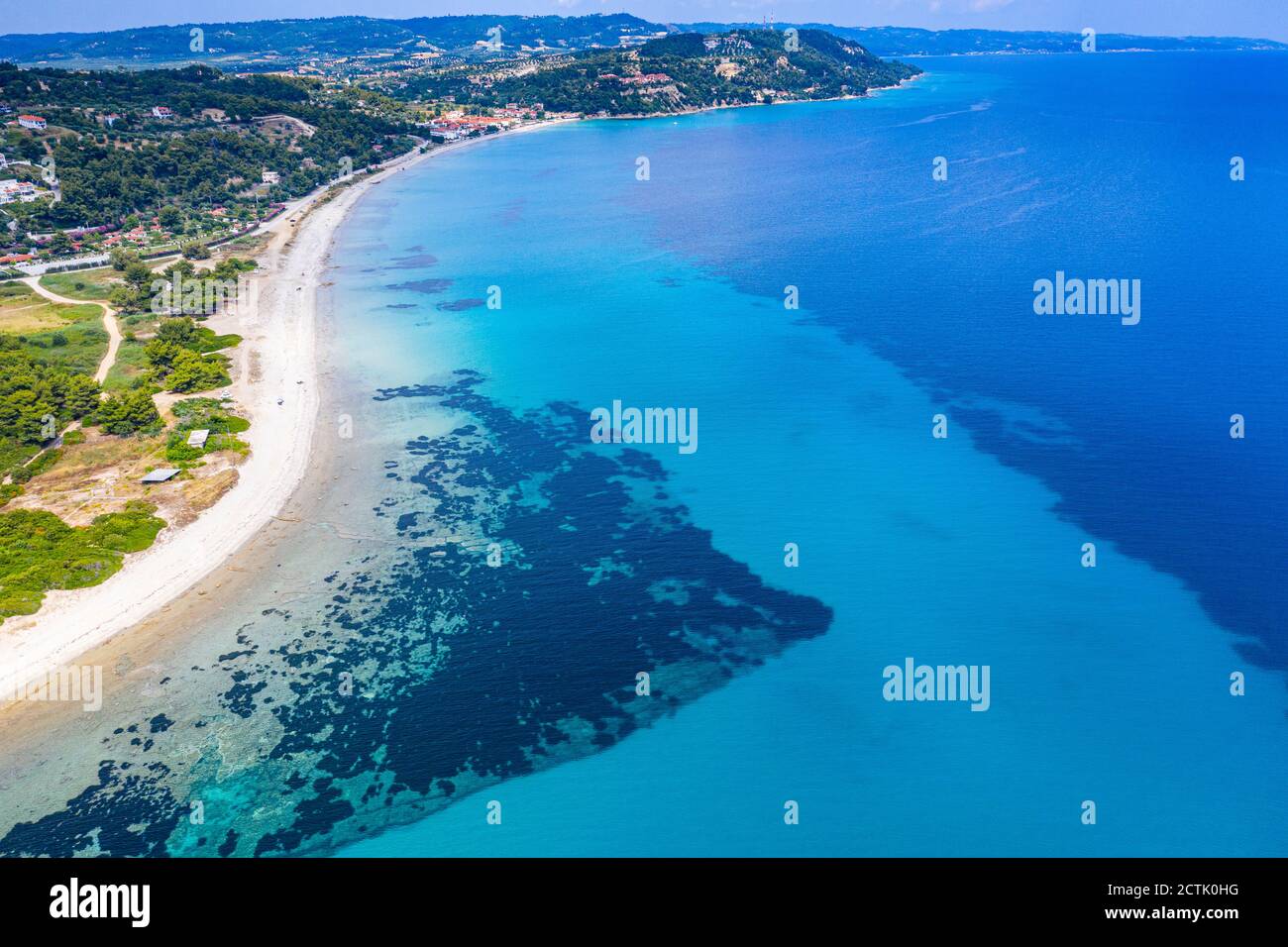 Greece, Kassandra, Aerial view of Possidi Beach in summer Stock Photo ...