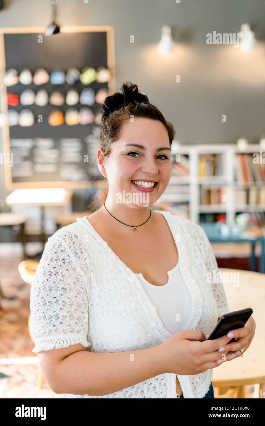 Toothy smile standing texting hi-res stock photography and images - Alamy