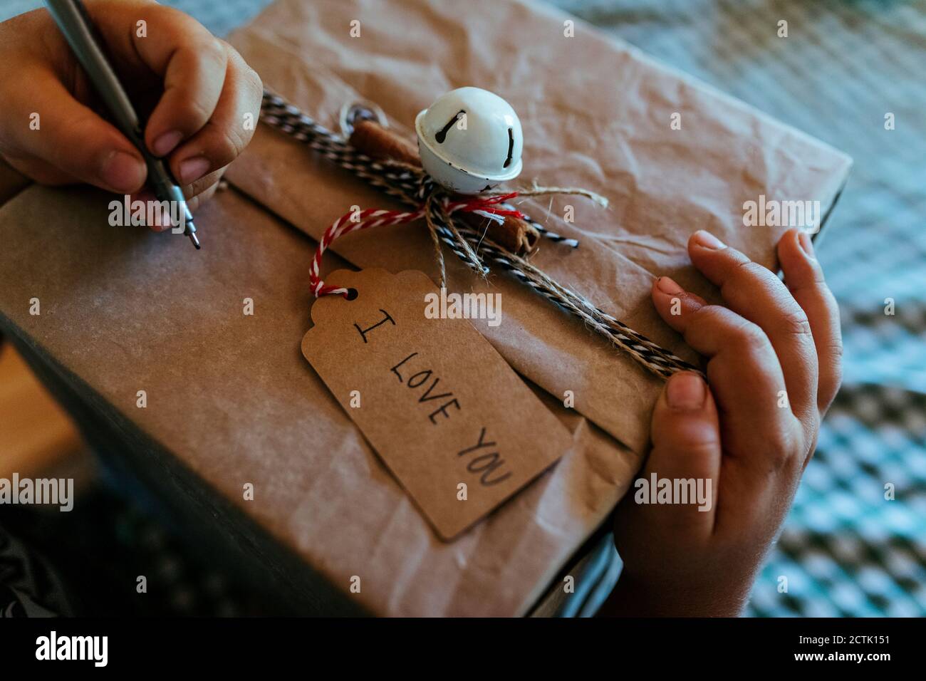Wrapped christmas boy hi-res stock photography and images - Alamy