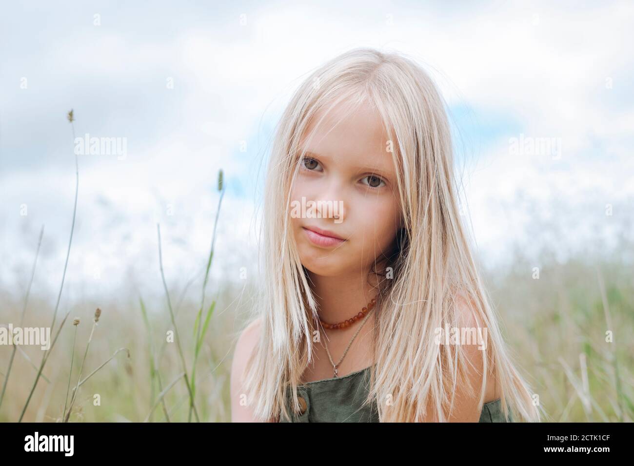 Serious blond girl hi-res stock photography and images - Alamy