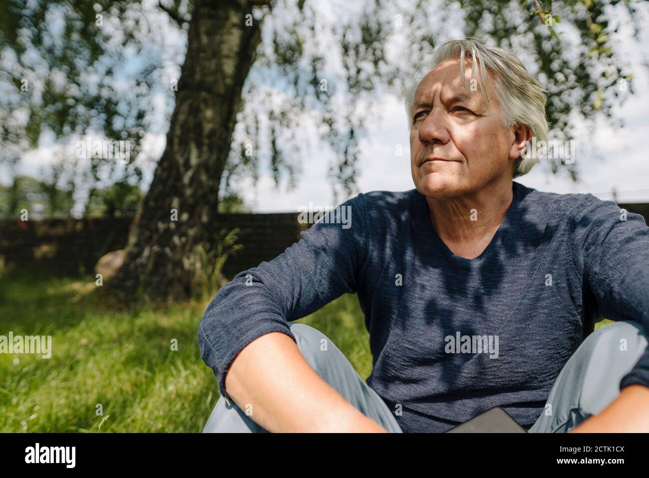 Contemplating man hi-res stock photography and images - Alamy