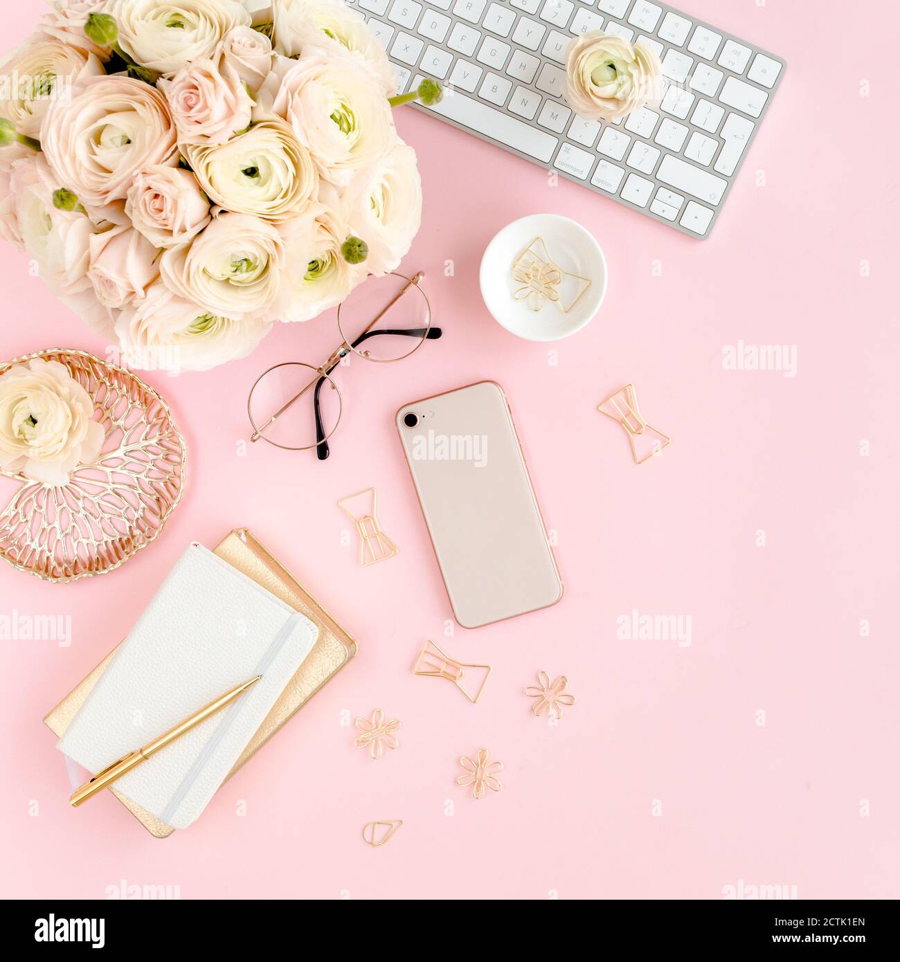 Stylized, pink women's home office desk. Workspace with computer ...