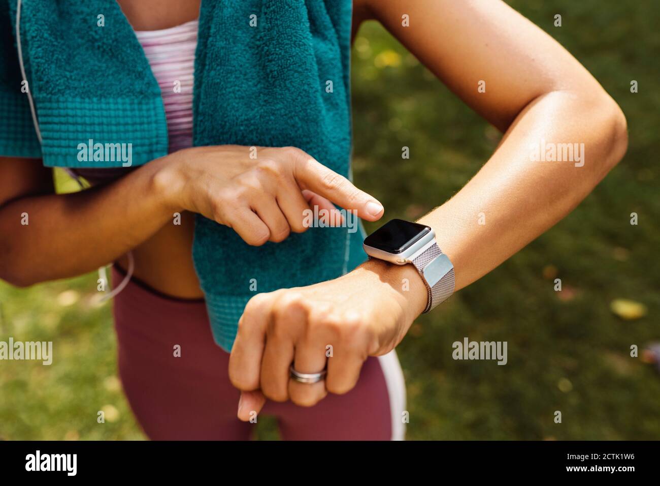 Sporty woman’s arm with smartwatch Stock Photo - Alamy