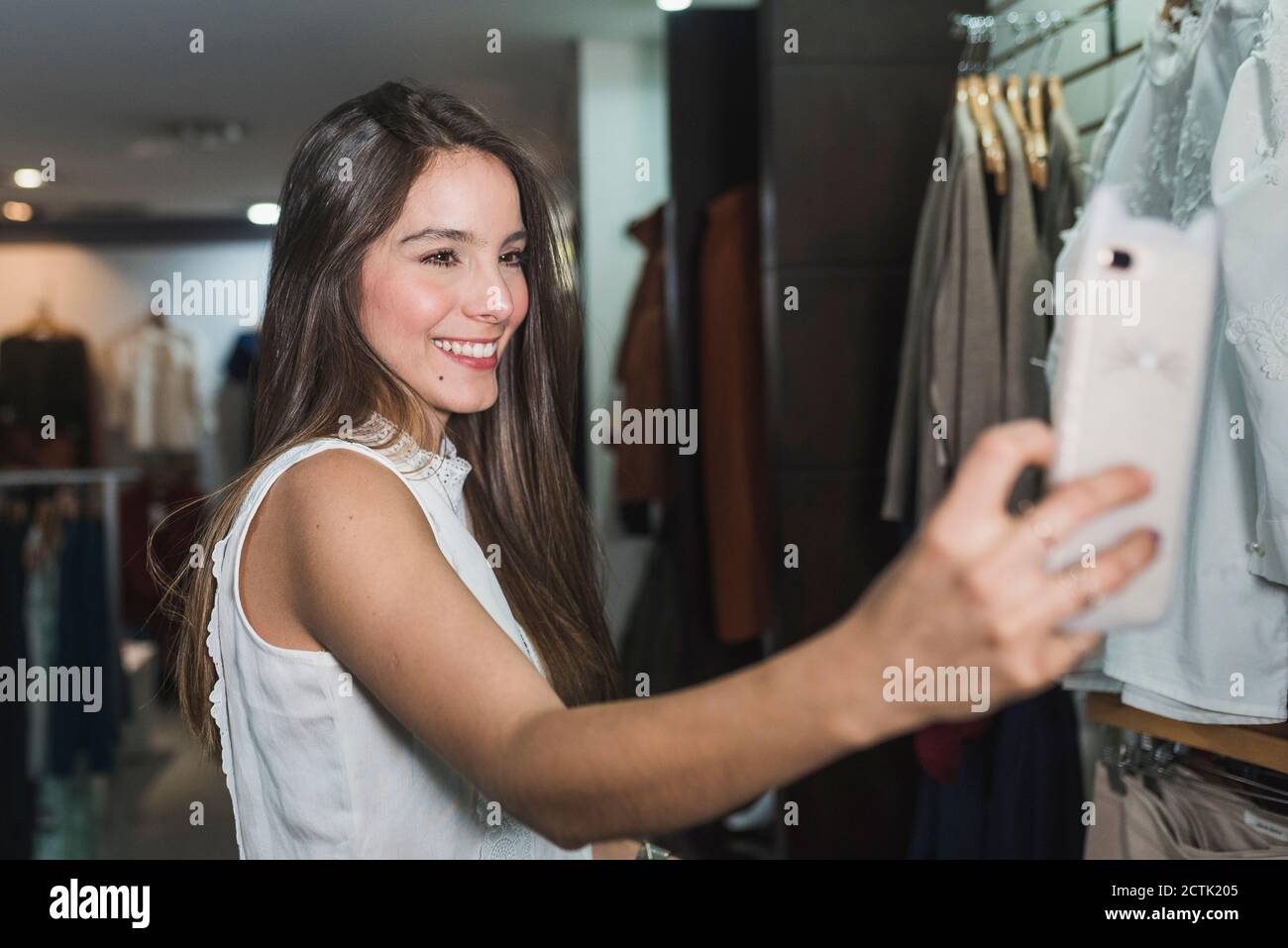 Standing consumerism smiling communication customer retail hi-res stock ...