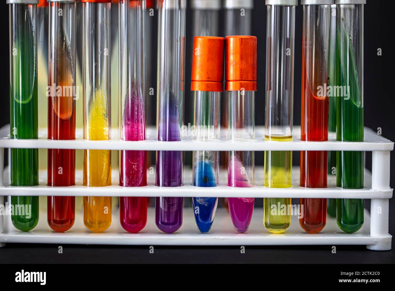 colorful rows of laboratory test tubes , science background. Laboratory ...