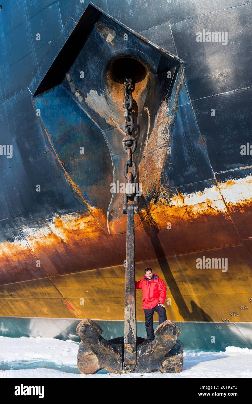 Portrait of man posing on top of anchor of ice-breaker 50 Years of ...