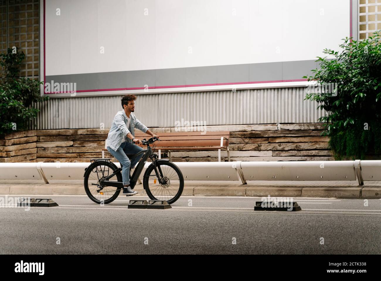 Riding her bicycle hi-res stock photography and images - Alamy