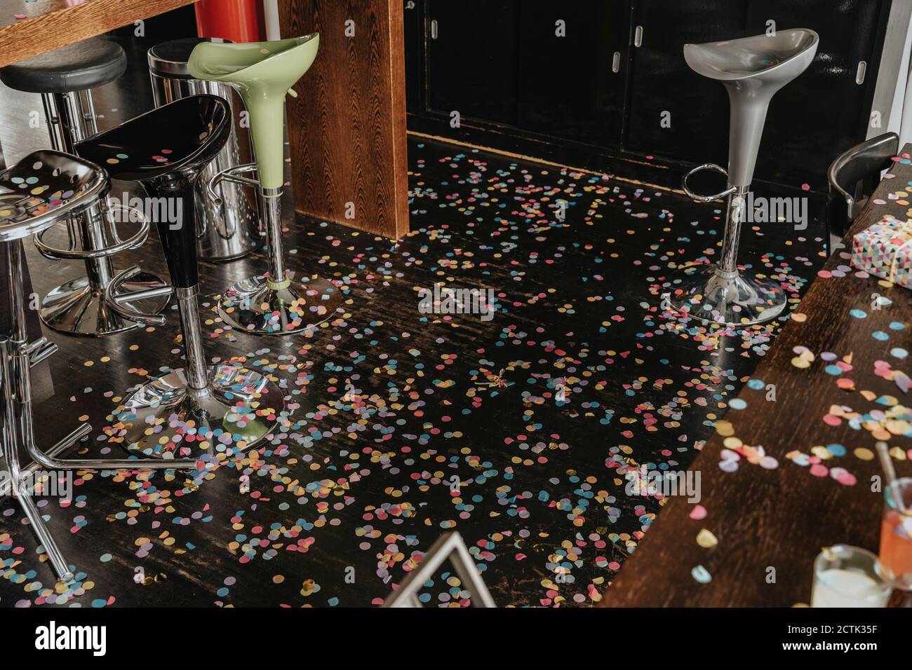 Confetti on floor at home after party Stock Photo - Alamy