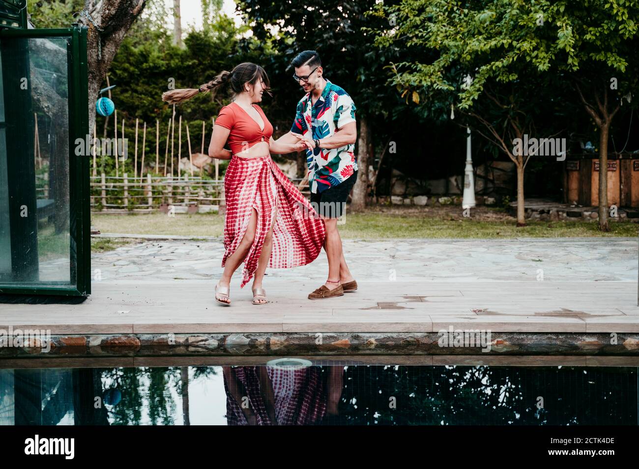 Man dancing swimming pool hi-res stock photography and images - Alamy