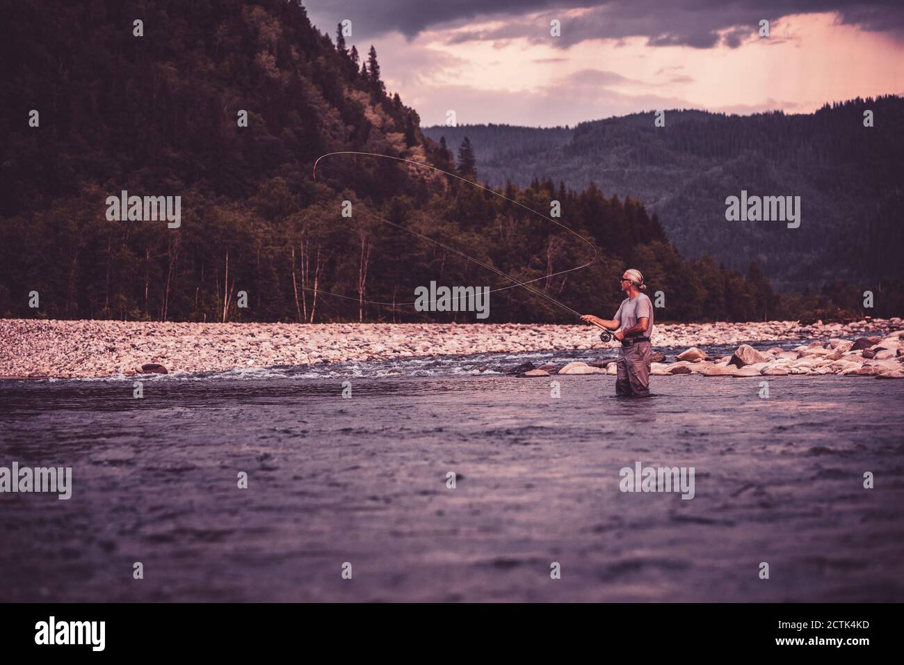 Person standing in river hi-res stock photography and images - Alamy